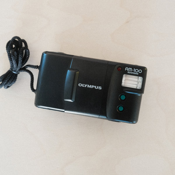 Olympus AM-100 – Focus Pocus